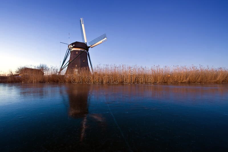 Dutch Winter scene stock image. Image of dawn, windmill - 7658853