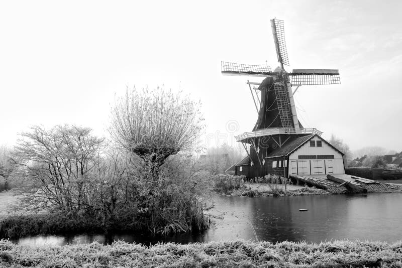 Dutch Wood Windmill Standing Near Water Stock Photo - Image of rural ...