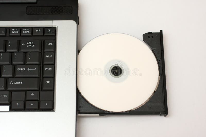 DVD or CD Being Loaded into Laptop Stock Image - Image of white, copy ...