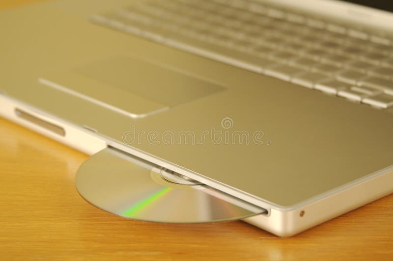 DVD/CD & Laptop stock photo. Image of electronics - 2762388