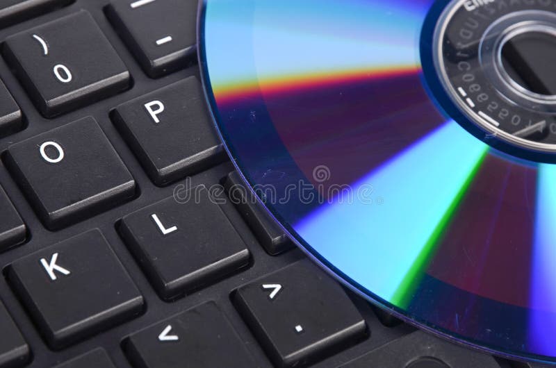 CD s & keyboard stock image. Image of computer, jewel - 3084301