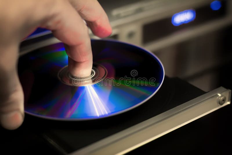 DVD disc in hand stock image. Image of game, audio, flick - 78765885