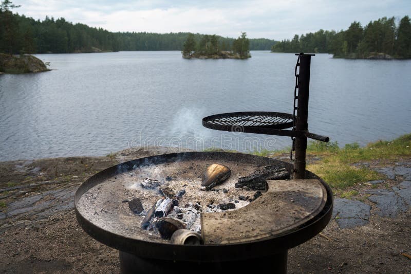 Dying Campfire by a Lakeside in Finland Stock Image - Image of pacurren ...
