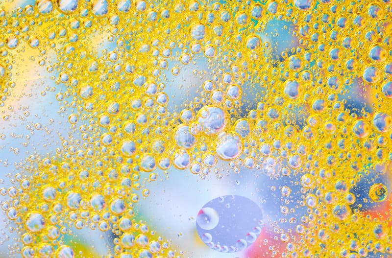 Vibrant Yellow and Blue Abstract Background with Oil Bubbles Stock ...