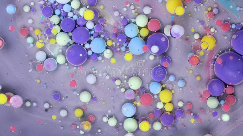 Colorful Bubbles Float in a Vibrant, Textured Mixture during a ...