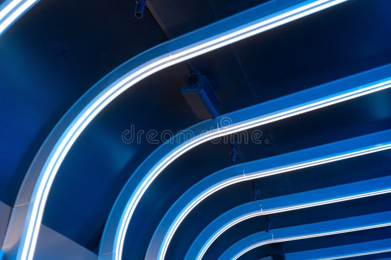 Dynamic Ceiling Lighting Installation with Curved Blue and White LED ...