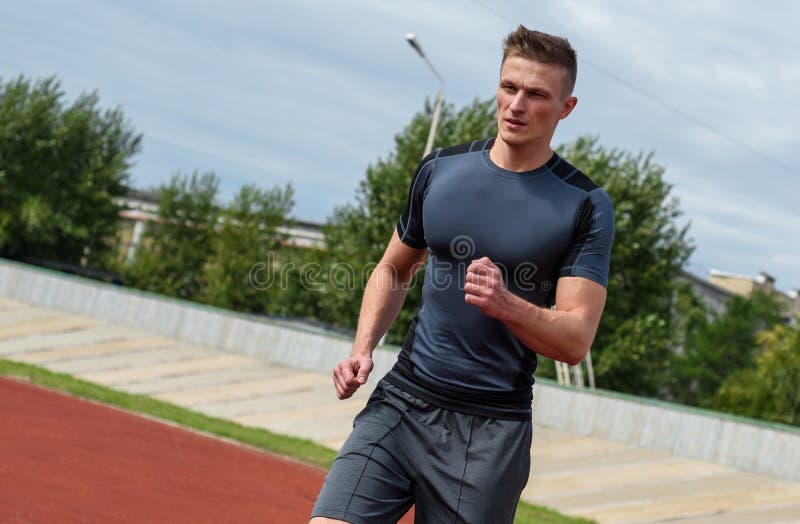 Dynamic Close Up Shot Of Running Man On The Stock Photo - Image of ...