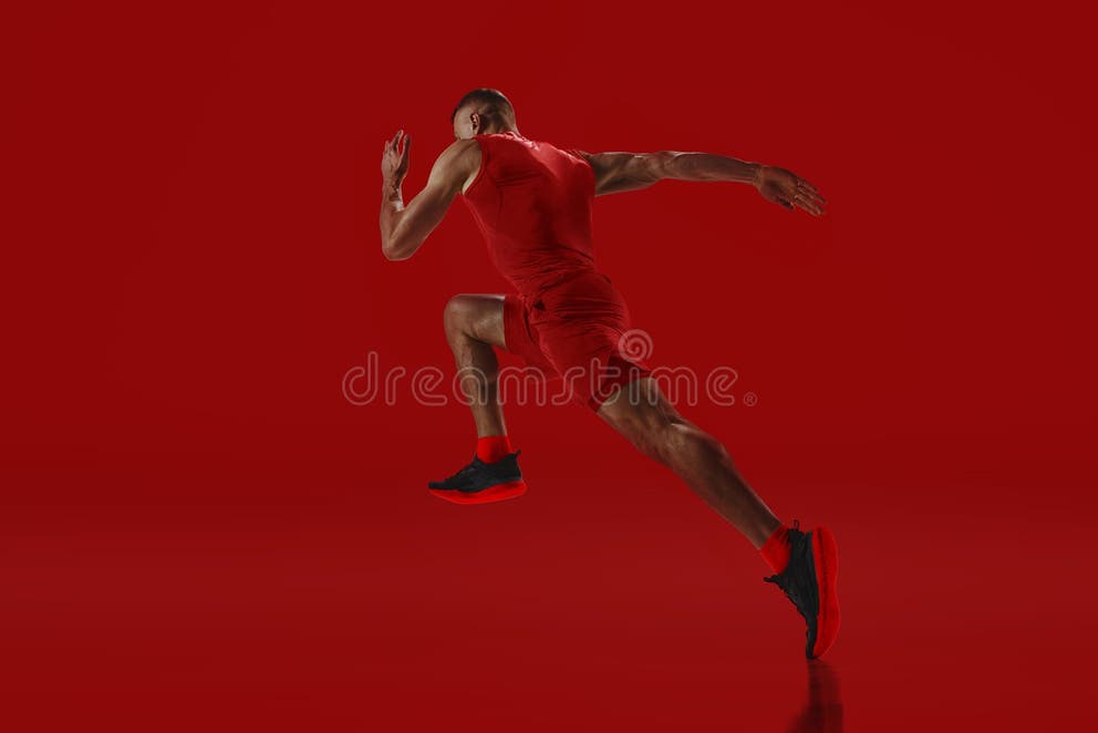 Dynamic Composition. Sprinter in Red Accelerating into Motion, Power ...
