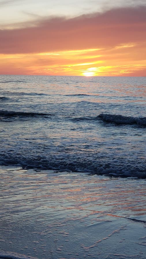 Dynamic Contrast of Water Waves and Sunset Stock Photo - Image of blue ...