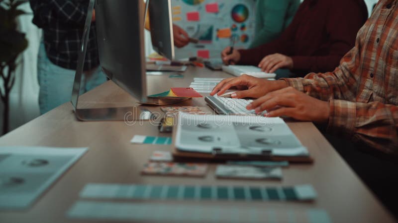 Engaged Creative Team Collaborating in a Modern Office Environment with ...