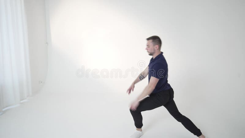 A Dynamic Dance Pose Captured in an Artistic Studio Setting with a ...