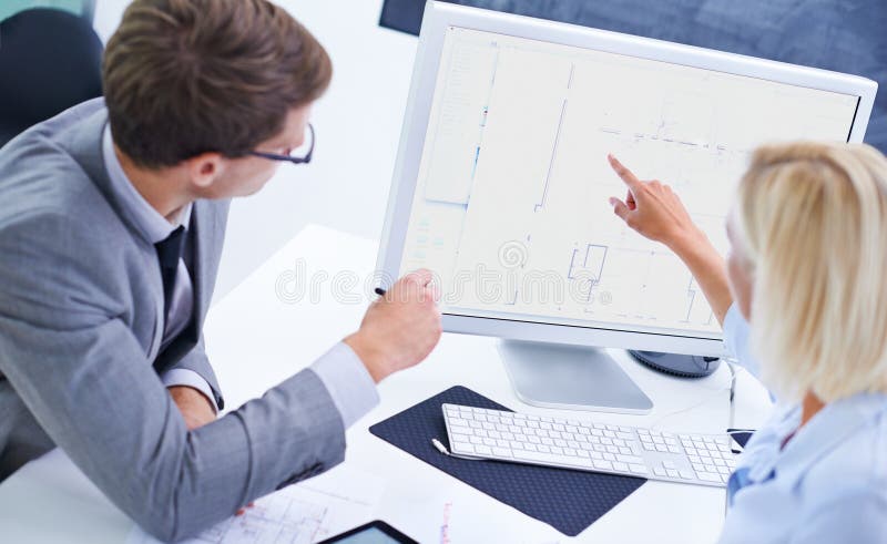 Executive Viewing Presentation on Laptop. Two Business Men at Table ...