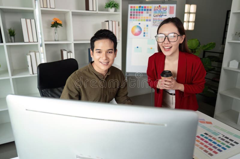 Teamwork and Innovation. Two Designers Sharing Ideas and Enjoying a ...