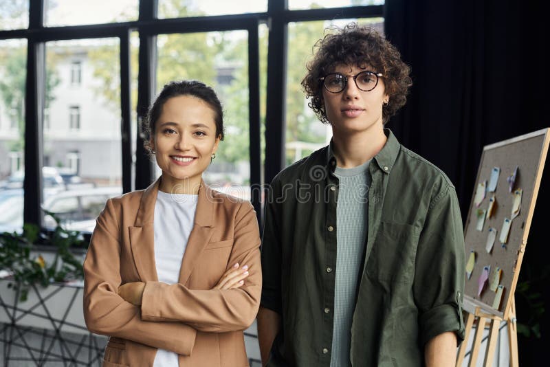 A Dynamic Duo Stands Confidently in Stock Image - Image of office ...