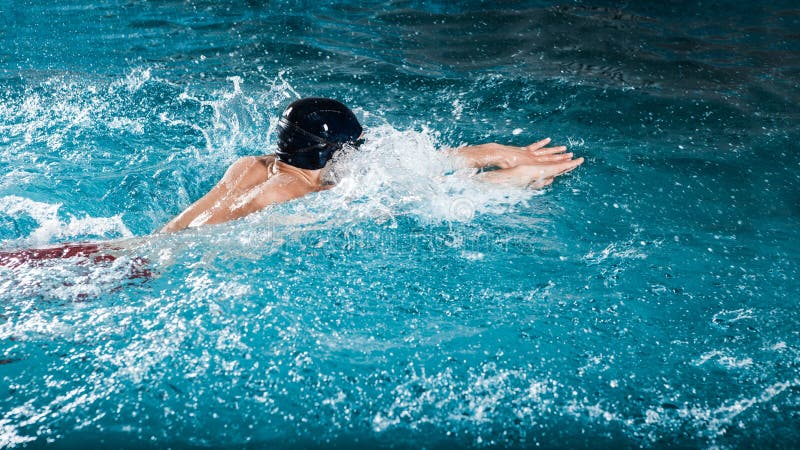 Dynamic and fit swimmer stock photo. Image of people - 79796202