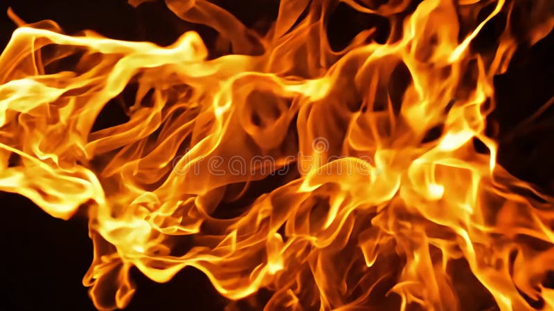 Dynamic Flames Dancing in Slow Motion Against Dark Backdrop Stock ...