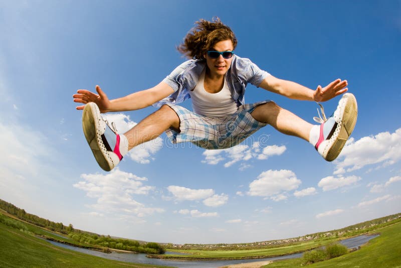 Dynamic guy stock photo. Image of leaping, handsome, countryside - 9957888