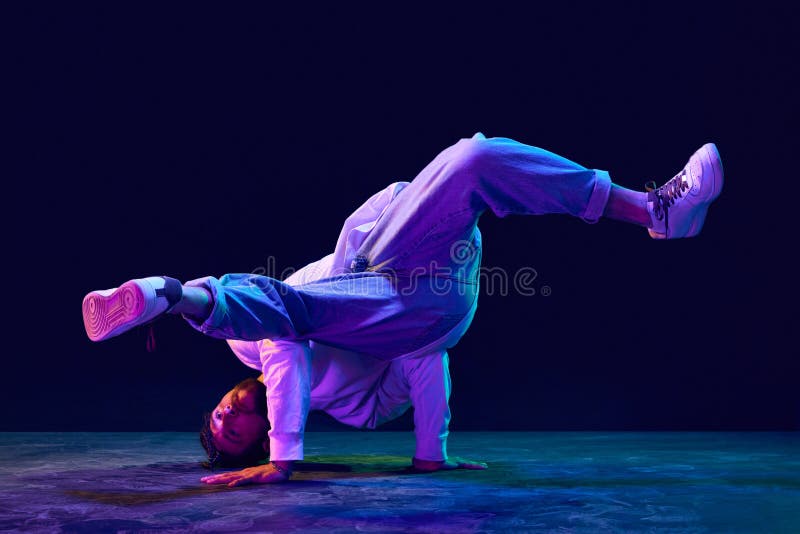 Dynamic Image of Active Young Man in Sport Style Clothes Dancing ...