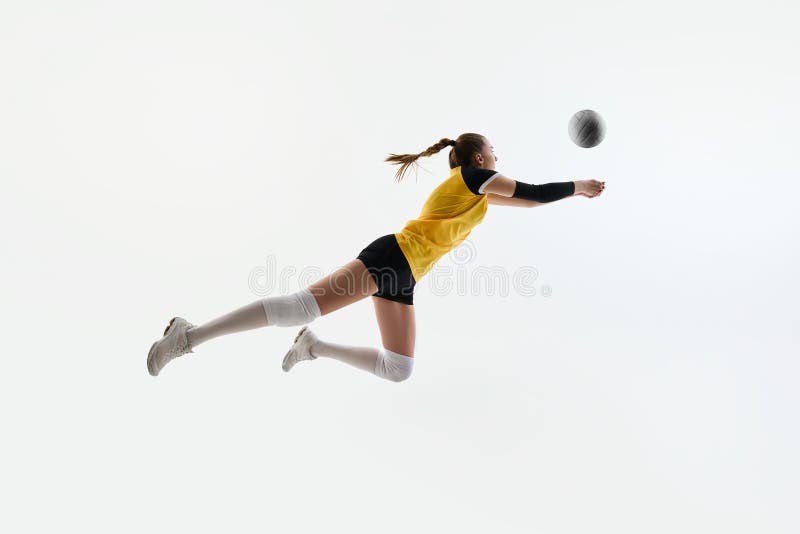 Dynamic Image of Female Volleyball Player in Motion Towards Ball ...