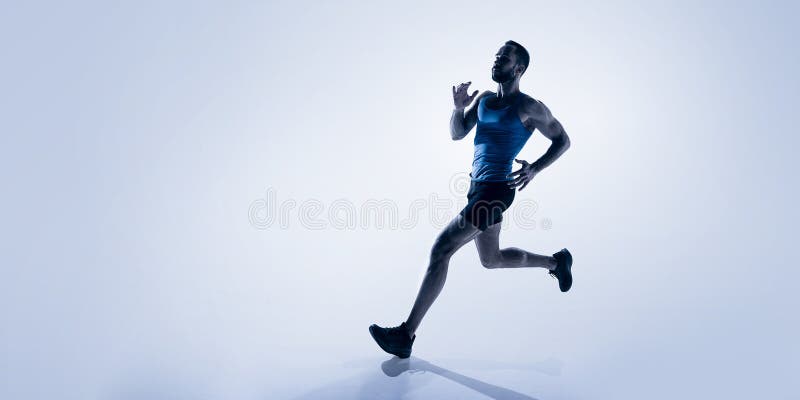 Dynamic Image of Muscular Young Man, Runner in Blue Jersey and Black ...