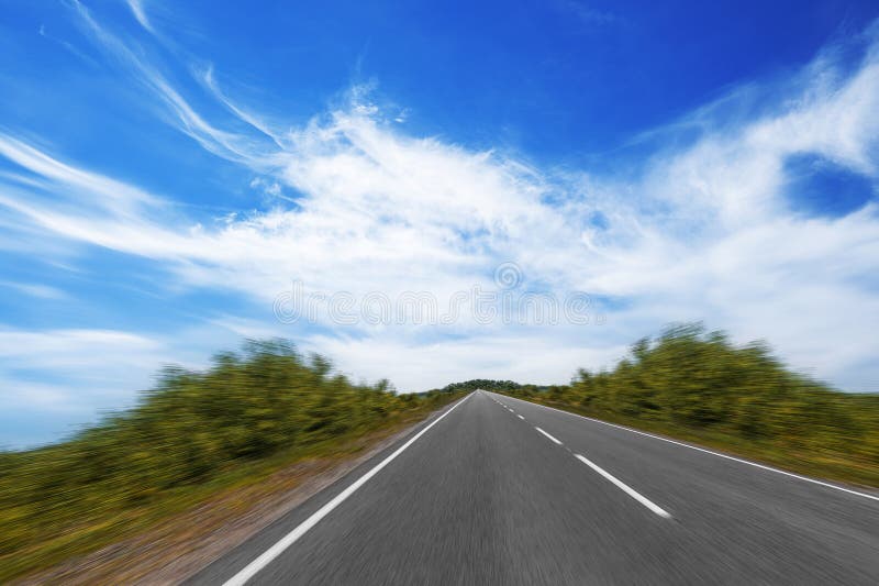 A Dynamic Image of an Open Highway Surrounded by Greenery, with a ...