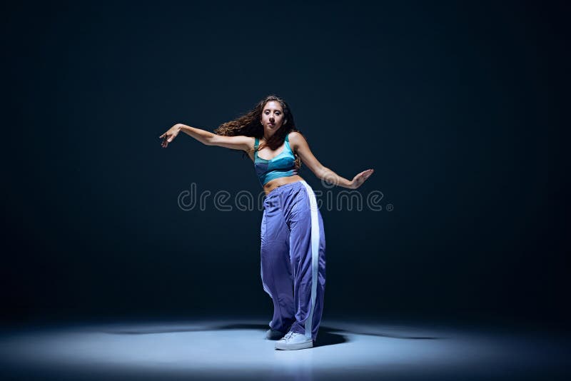 Dynamic Image of Young Girl, Dancer Showing Technique during Focused ...
