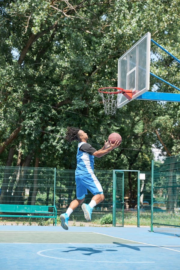 Dynamic Image of African Man, Basketball Player in a Jump, Throwing ...
