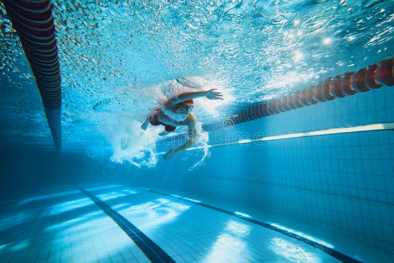 Dynamic Image of Young Man, Swimmer in Motion, Swimming Freestyle ...