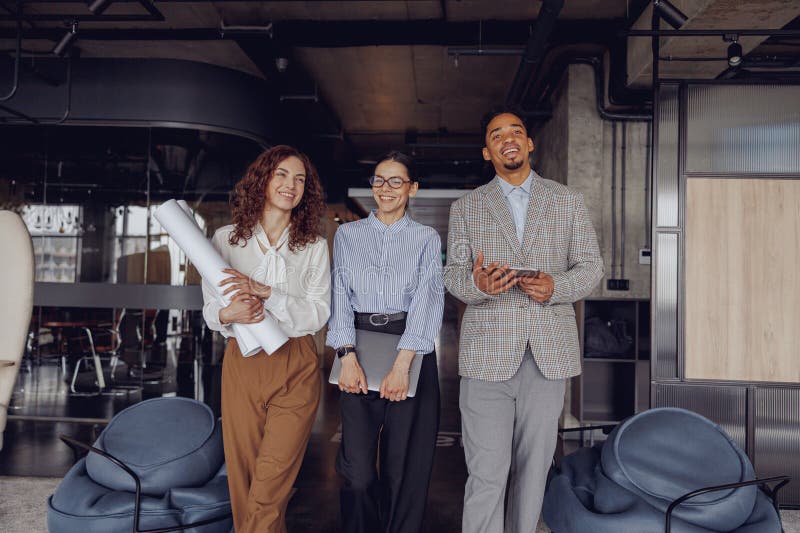 A Diverse Team Effectively Collaborating in a Modern Office Environment ...