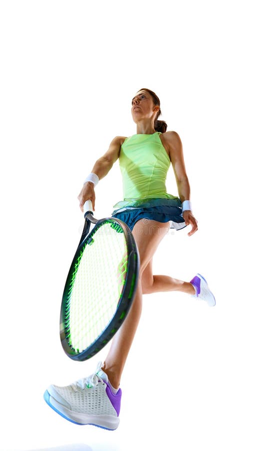 Dynamic, Low Angle Shot of Tennis Player in Mid-leap Holds Racket in ...