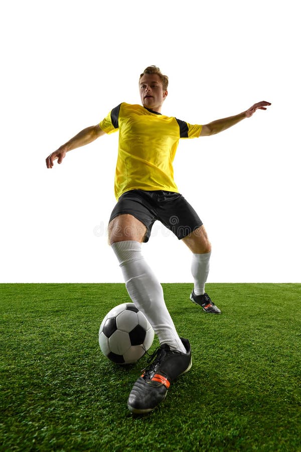 Dynamic Low Angle View of Young Man, Soccer Player Controlling Ball ...