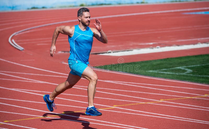 Dynamic Movement of Male Runner on Running Track, Run Stock Photo ...