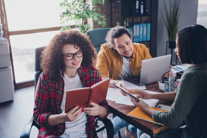 Diverse Group of Colleagues Collaborating in a Modern Office with ...