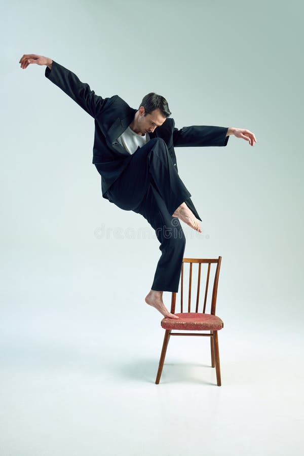 Dynamic Photo of Businessman in Midair Expressing Transition between ...
