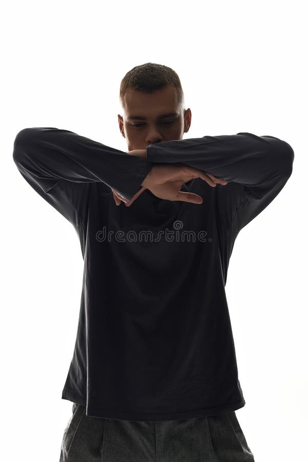 Dynamic Pose of a Handsome Young Stock Image - Image of emotional, arms ...