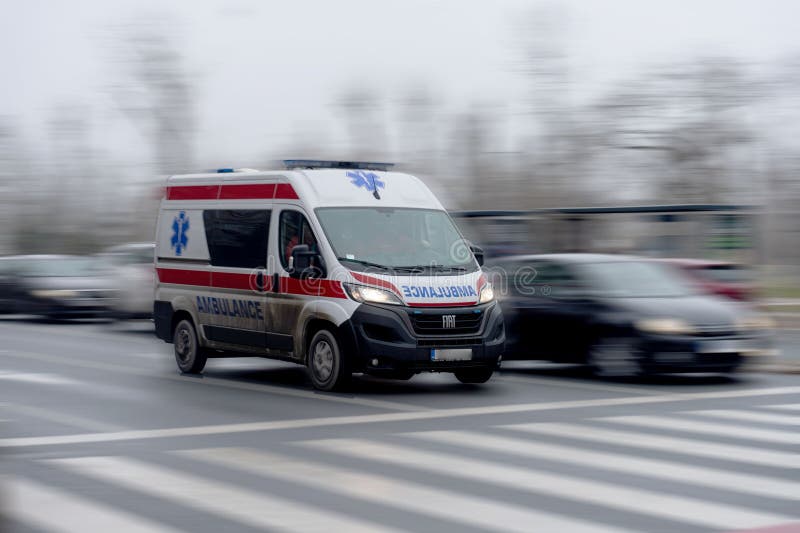 Ambulance on the Move, Side View Demonstrating Rapid Medical ...