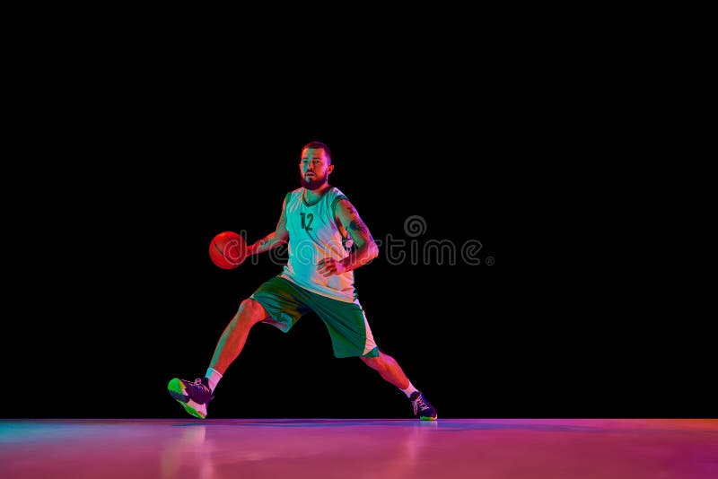 Dynamic Shot Capturing Skilled Basketball Player in Action, Focused and ...