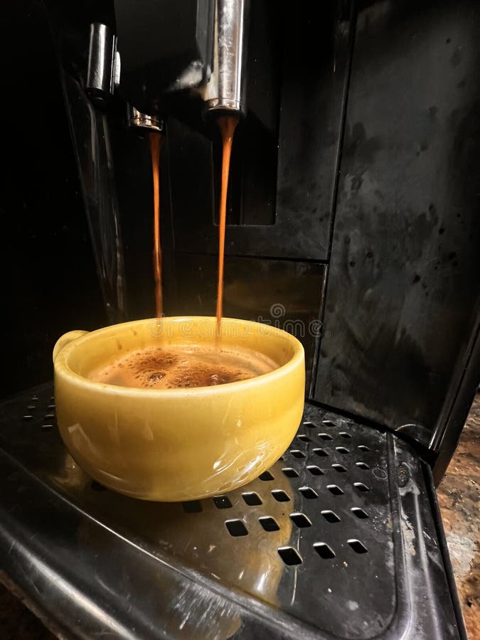 Espresso Brewing from Machine into Coffee Cup Stock Image - Image of ...