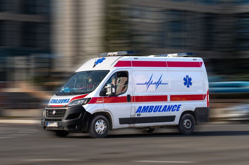 Side View of a Moving Ambulance Showcasing Rapid Medical Response To an ...