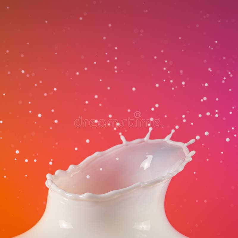 Dynamic Splash of Milk Forms a Crown-like Shape Against a Vibrant ...