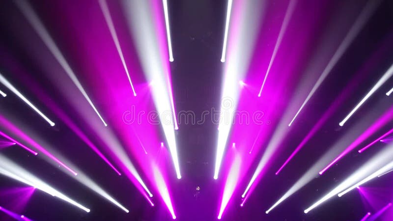 Dynamic Stage Lighting with Rays of Blue Light Cutting through Haze in ...
