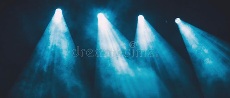 Dynamic Stage Performance with Varied Lighting and Multiple Spotlights ...