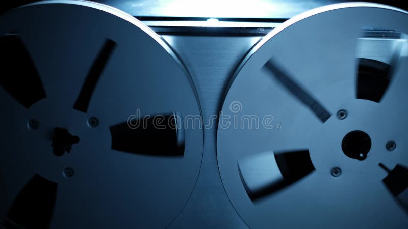 Dual Reels Spinning on Reel-to-Reel Tape Player Stock Video - Video of ...