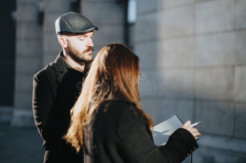 Dynamic Young Entrepreneurs Engaging in a Business Conversation ...