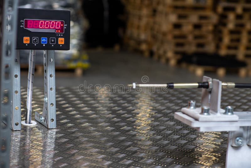 A Dynamometer for Testing Brake Cables in Production. Stock Photo ...