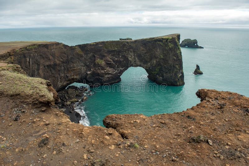 Dyrholaey Rock Arch in the Atlantic Ocean, Iceland Stock Photo - Image ...