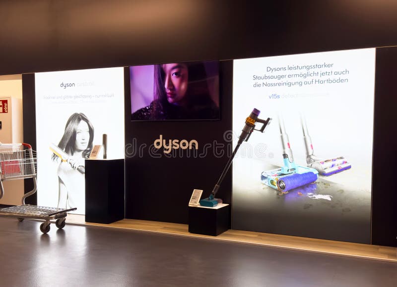 Dyson Vacuum Display in Store with Bilingual Product Advertisements ...