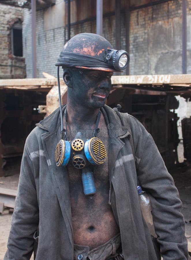 Dzerzhinsk, Ukraine - August 20, 2013: Miner Working on a Jackhammer ...