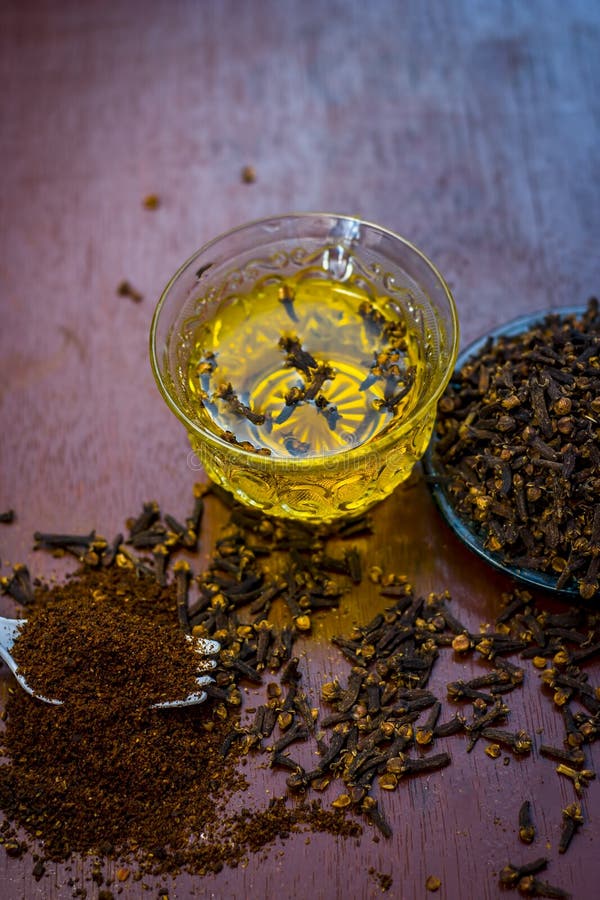 Tea of Clove or Laung with Raw Cloves and Its Powder. Imagem de Stock ...