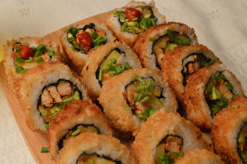 Delicious Fried Sushi Served in a Wooden Board Stockfoto - Bild von ...